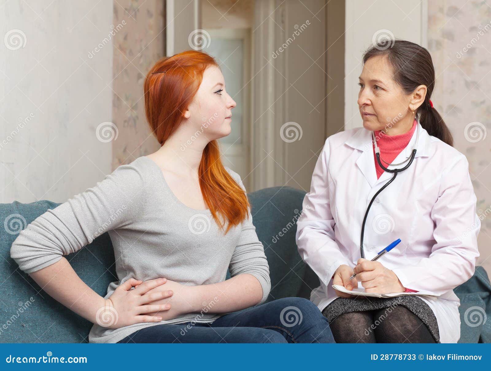 Patient Complaining To Doctor about Stitch in Side Stock Image - Image ...