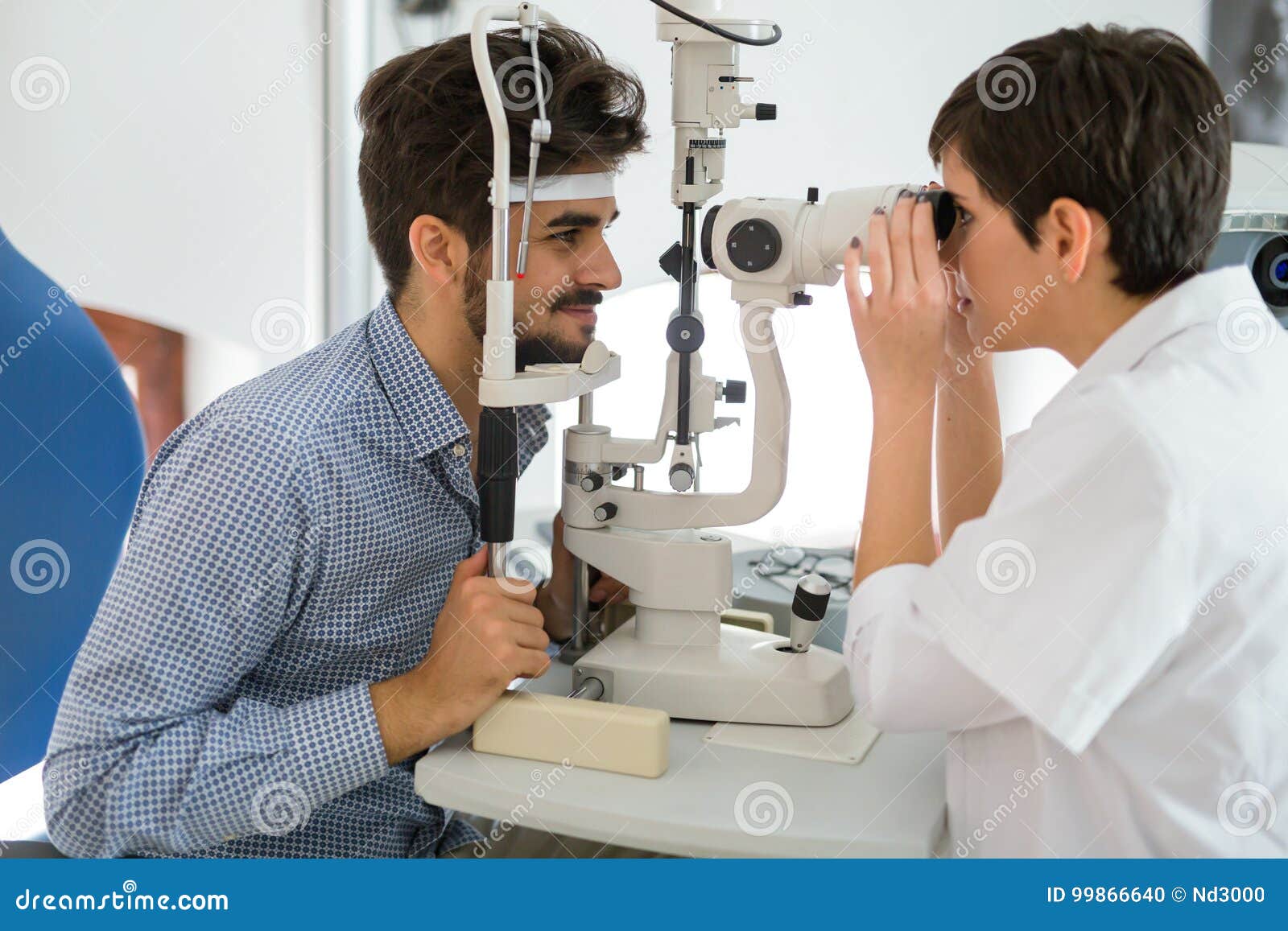 Patient or Customer at Slit Lamp at Optometrist or Optician Stock Photo ...