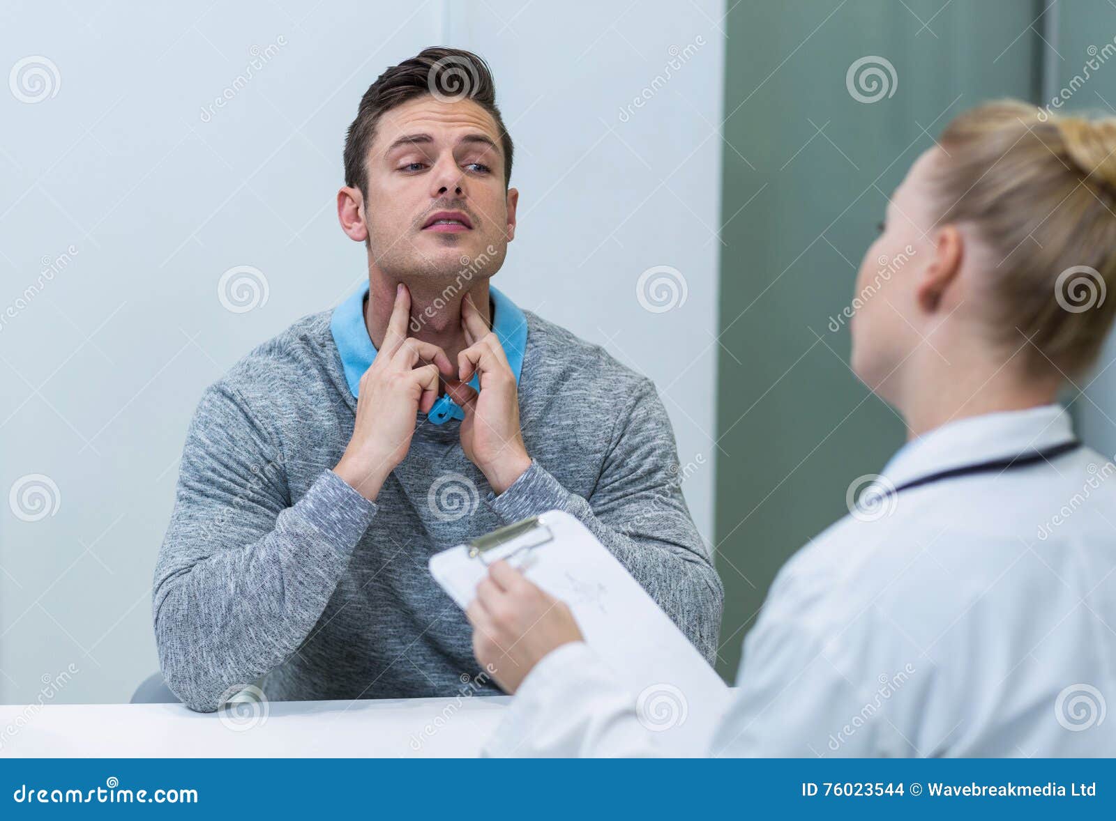 Patient Discussing His Problem with Female Patient Stock Photo - Image ...