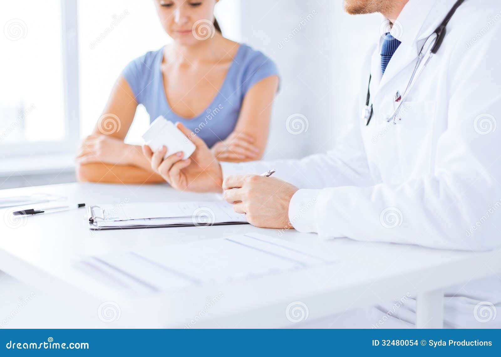 Patient and Doctor Prescribing Medication Stock Photo - Image of paper ...