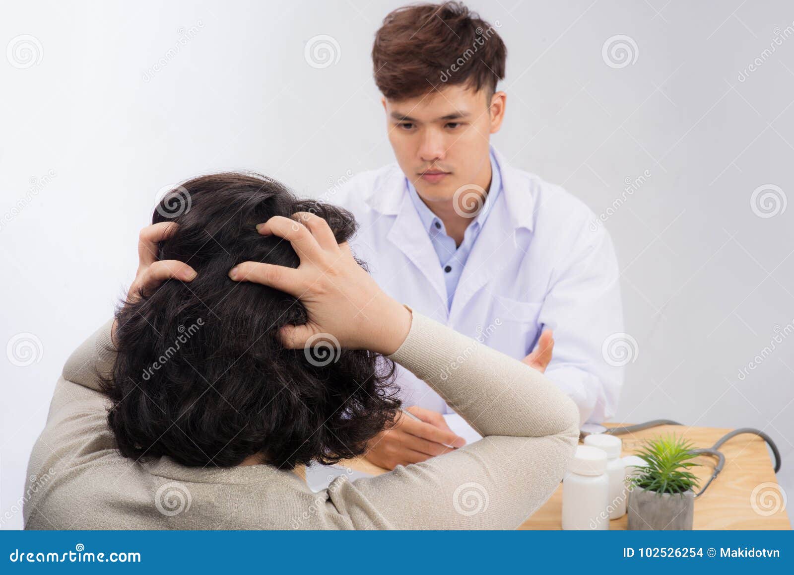 Patient in the Doctor`s Office Receiving Bad News, she is Desper Stock ... Patient in the Doctor`s Office Receiving Bad News, she is Desper Stock ...