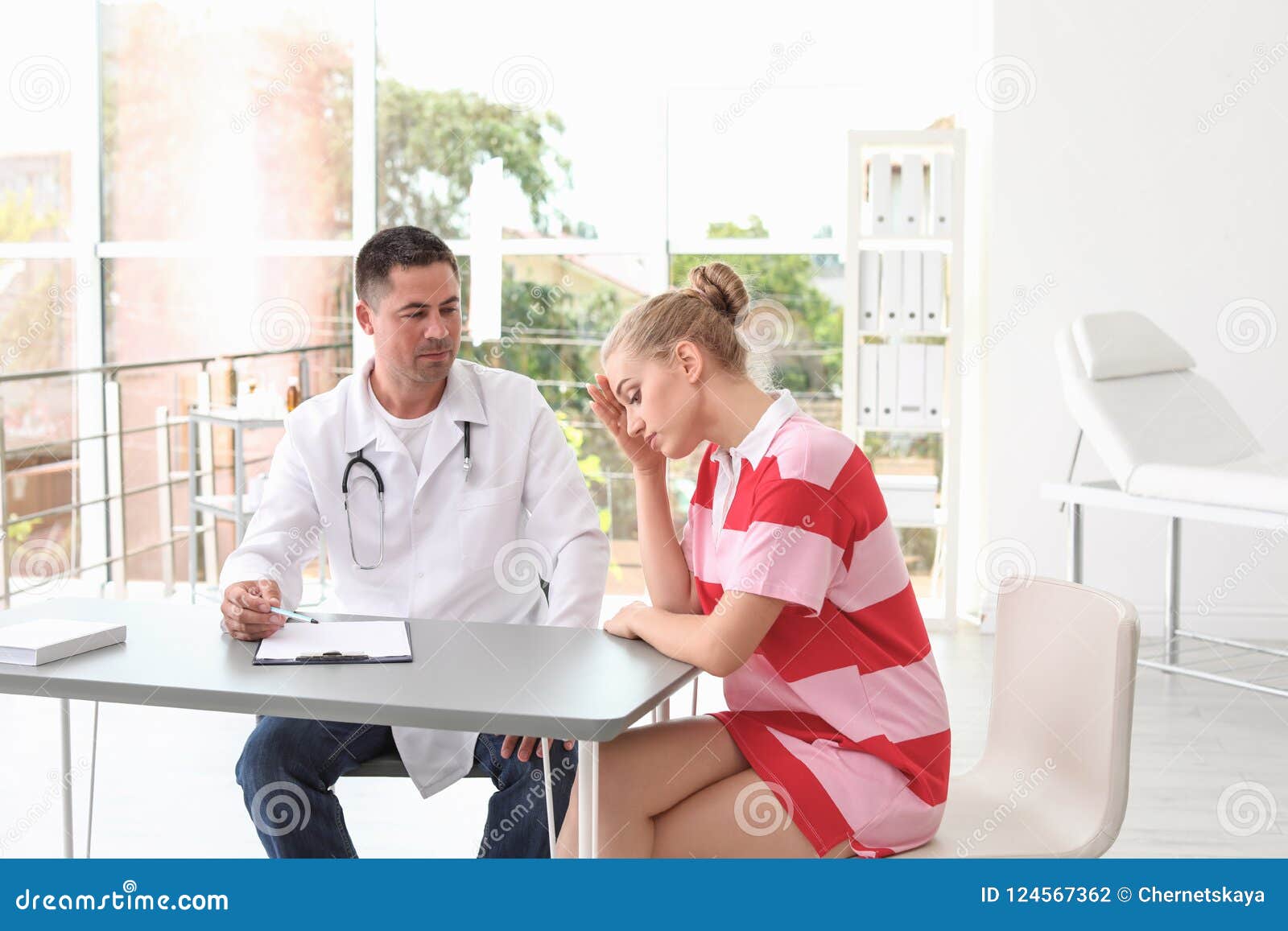 Patient Having Appointment with Doctor Stock Photo - Image of male ...