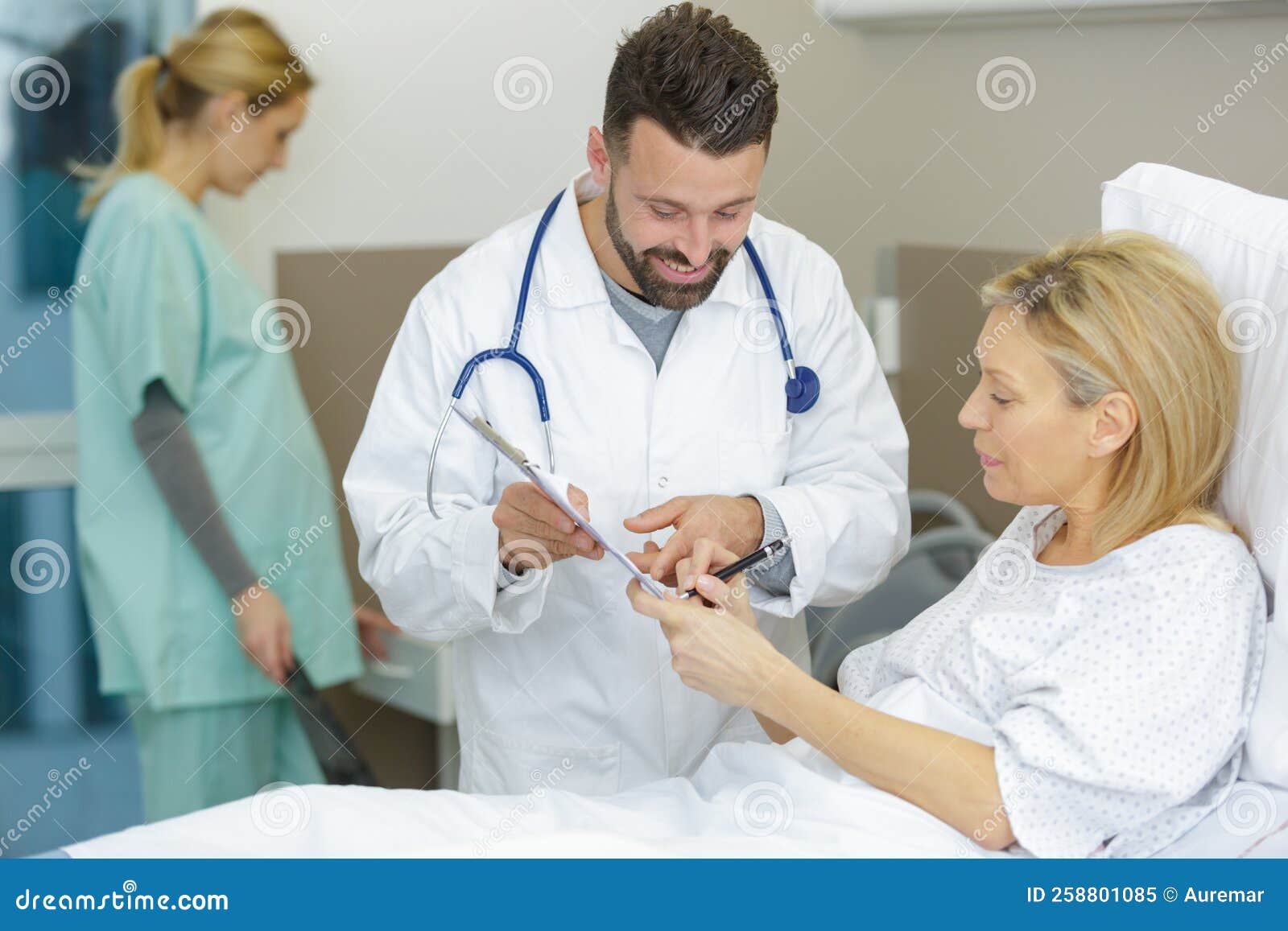 Patient in Hospital Bed Signing Consent Form Stock Image - Image of ...