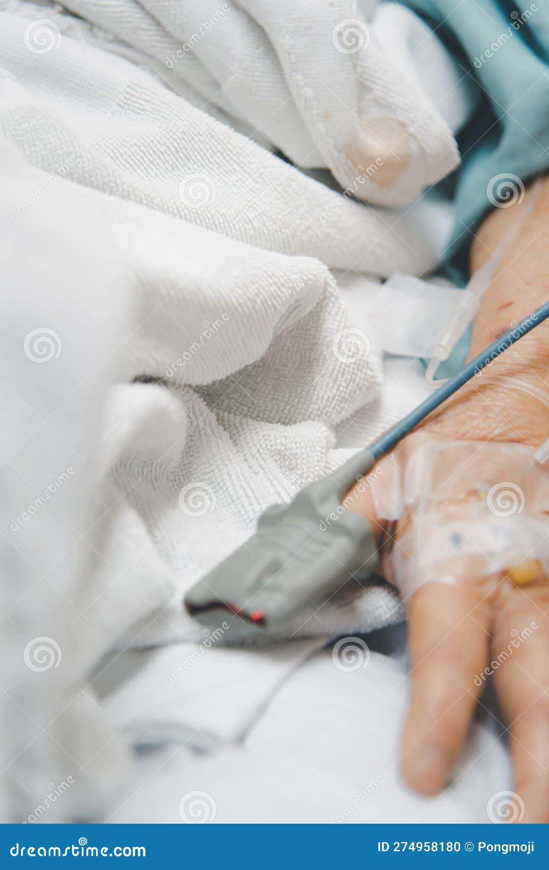 Patient in the Hospital with Pulse Gauge on Finger Stock Photo - Image ...