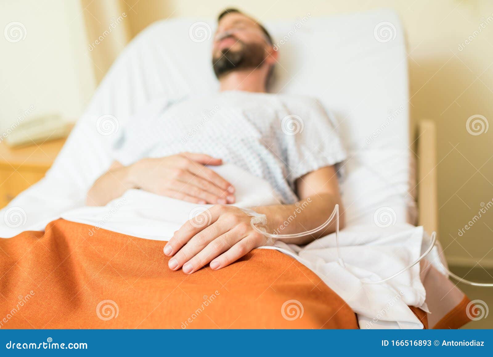 Patient with Iv Drip Suffering on Hospital Bed Stock Image - Image of ... Patient with Iv Drip Suffering on Hospital Bed Stock Image - Image of ...