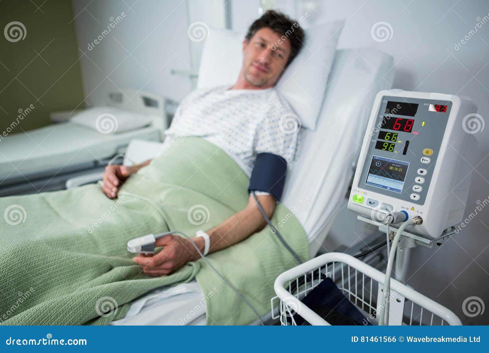 Patient Looking His Pulse Rate in Machine Stock Photo - Image of ...