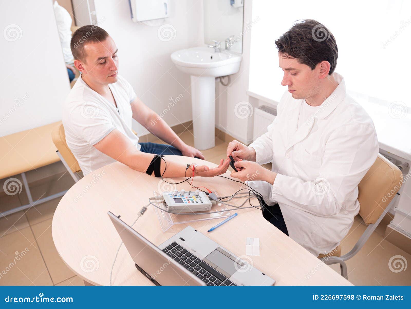 Patient Nerves Testing Using Electromyography At Medical Center Stock ...