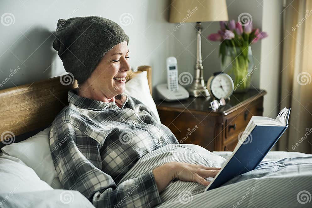 Patient Reading Book in Bed Stock Photo - Image of cheerful, book ...