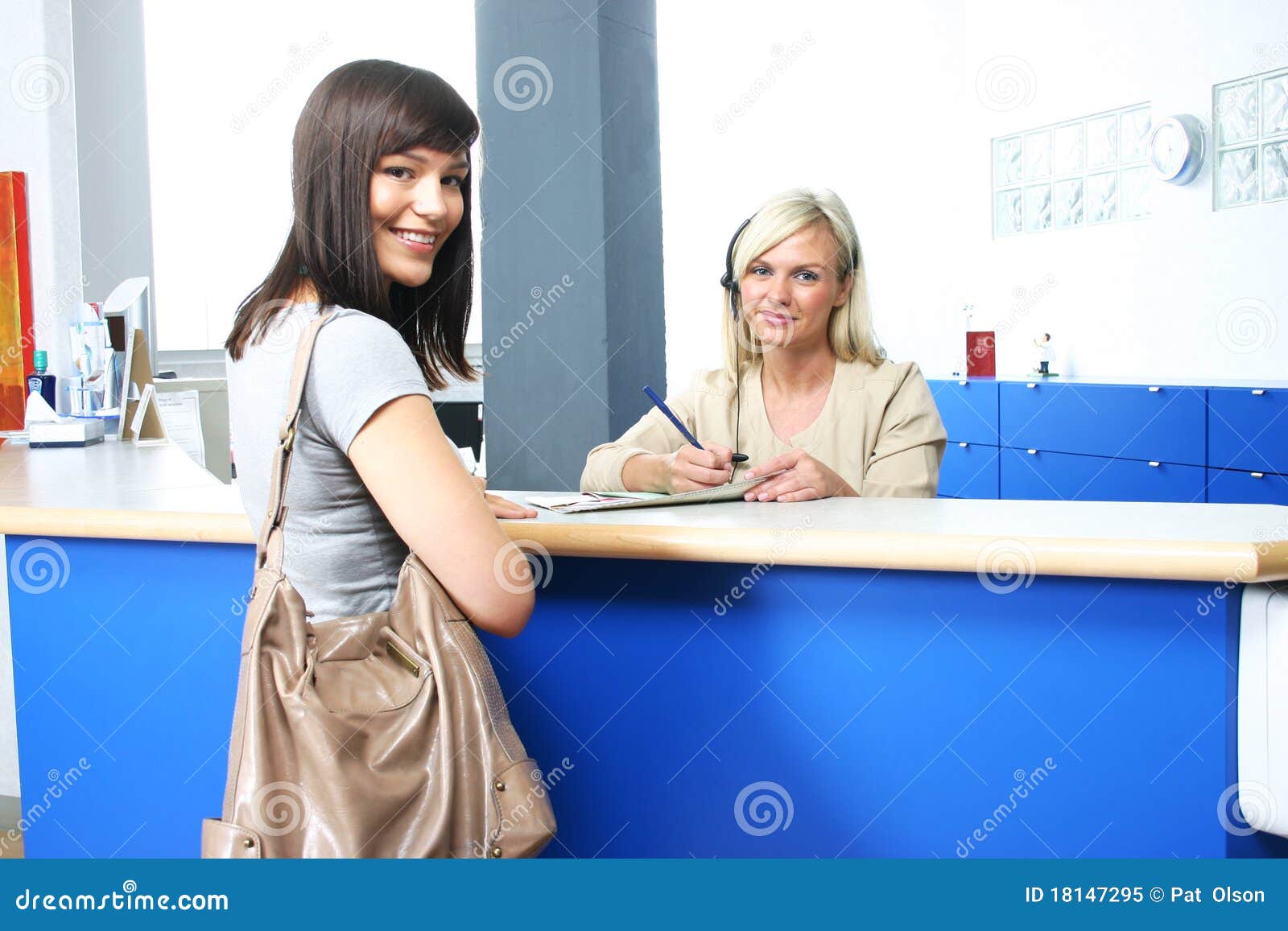 Patient & receptionist stock image. Image of smile - 18147295