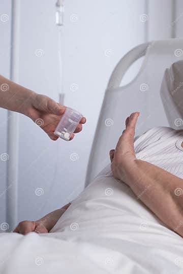 Patient Refusing To Take Medication Stock Photo - Image of help, aged ...