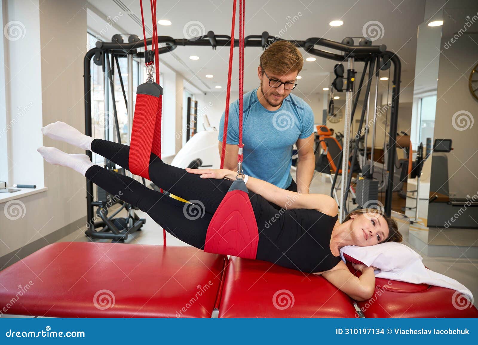Patient is Secured in Suspended Loop System on a Rarecord Stock Photo ...