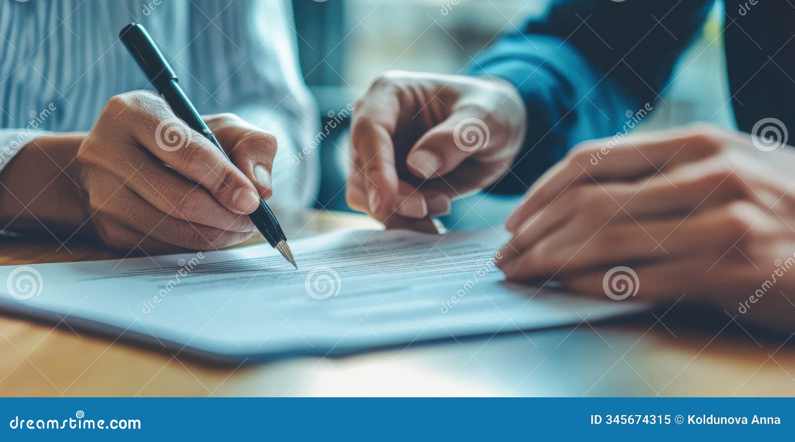 A Patient Signing an Informed Consent Form before Participating in a ...