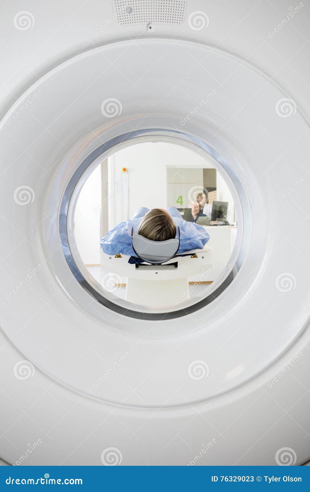 Patient Undergoing CT Scan while Doctor S Using Computers Stock Image ...