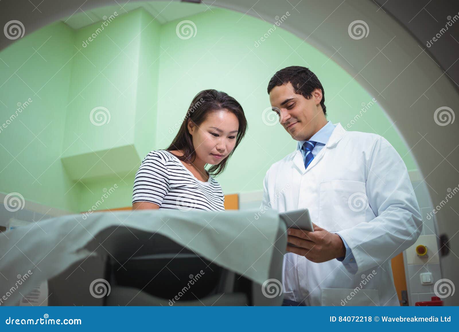 Patient Undergoing CT Scan Test Stock Photo - Image of computerized ...
