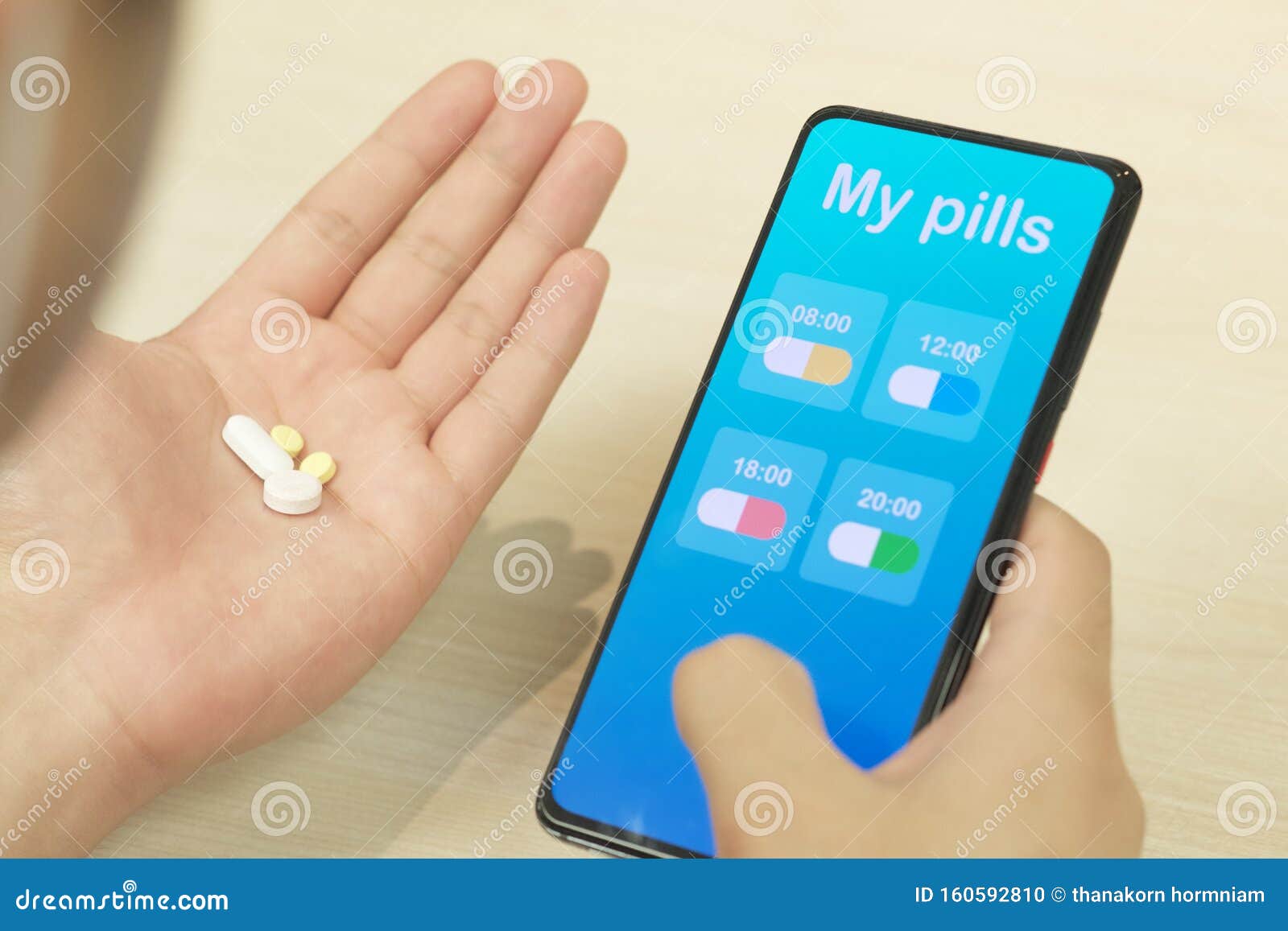 A Patient Using Mobile Application for Reminding Her Medical Pills ...