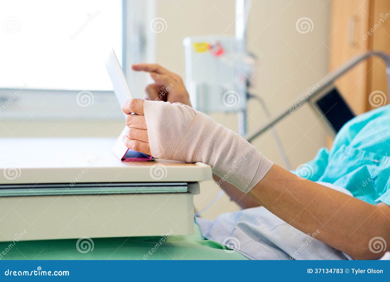 Patient Using Tablet Computer while Relaxing in Stock Image - Image of ...
