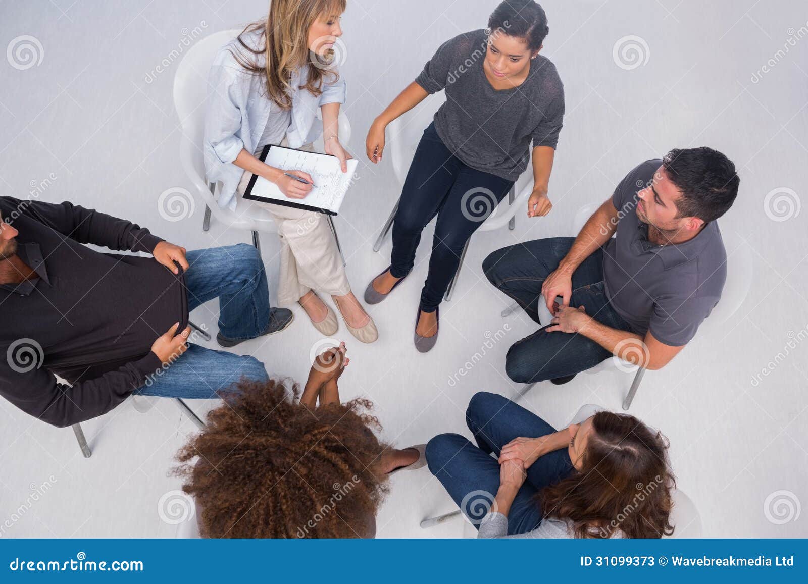 Patients Listening To Each Other in Group Session Stock Image - Image ...