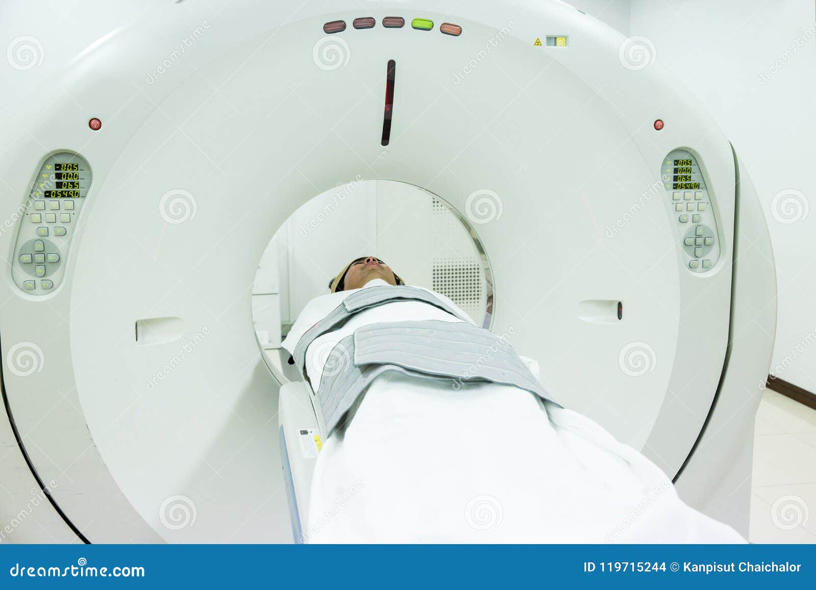 Patients Screening On CT Scanner. Man Undergoing CT Scan While Doctor`s ...