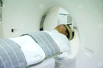 Patients Screening on CT Scanner. Man Undergoing CT Scan while Doctor`s ...
