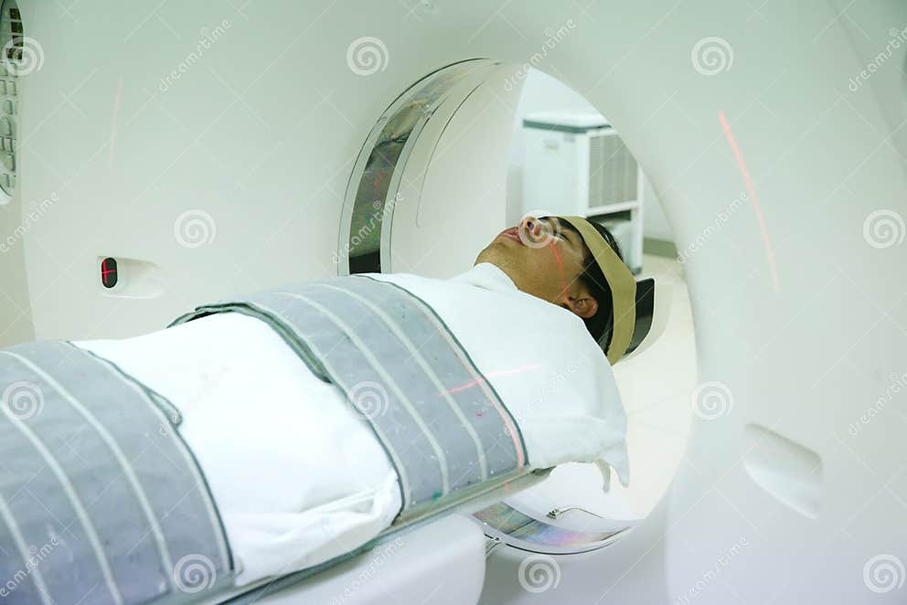 Patients Screening on CT Scanner. Man Undergoing CT Scan while Doctor`s ...
