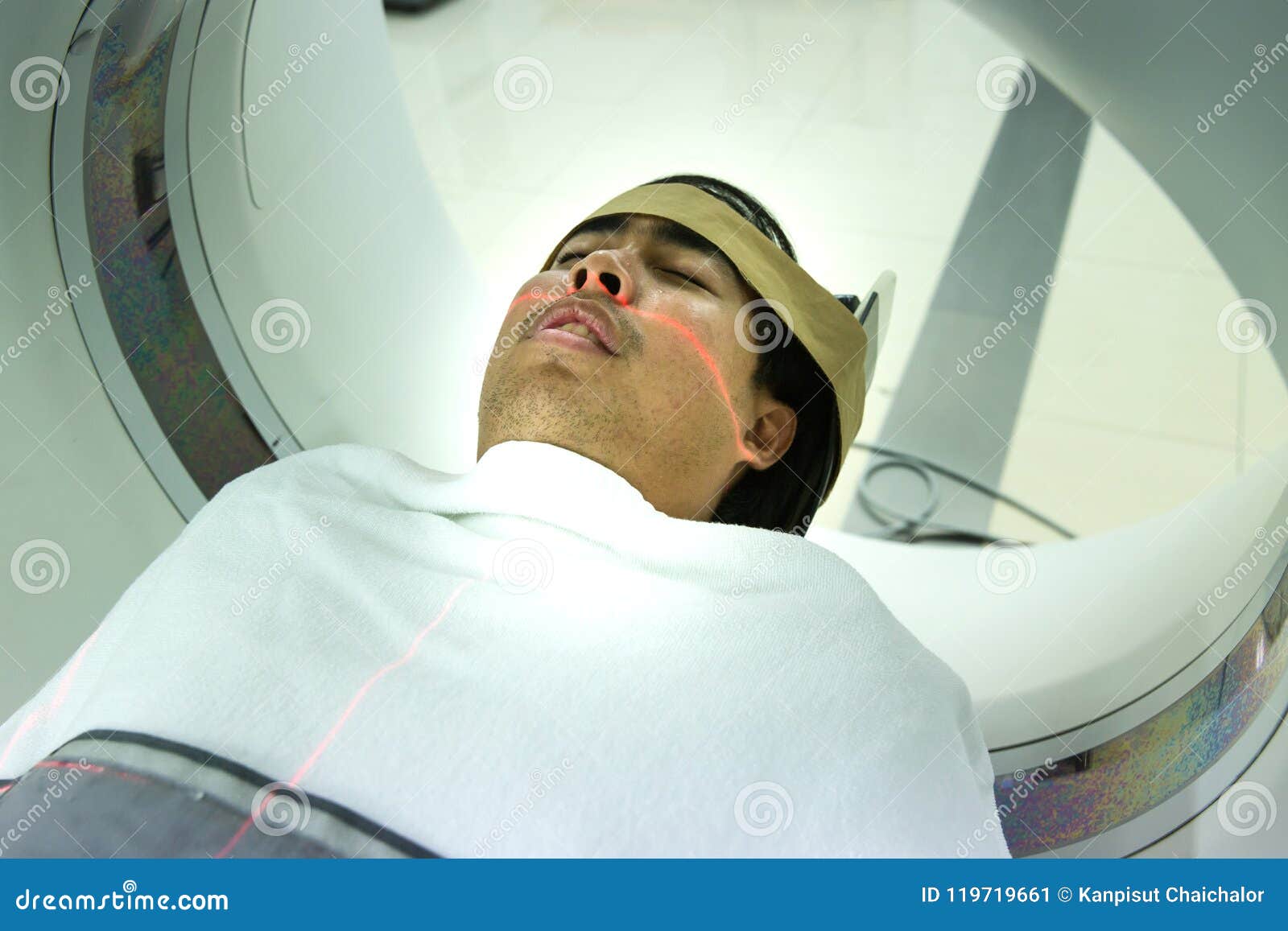 Patients Screening On CT Scanner. Man Undergoing CT Scan While Doctor`s ...