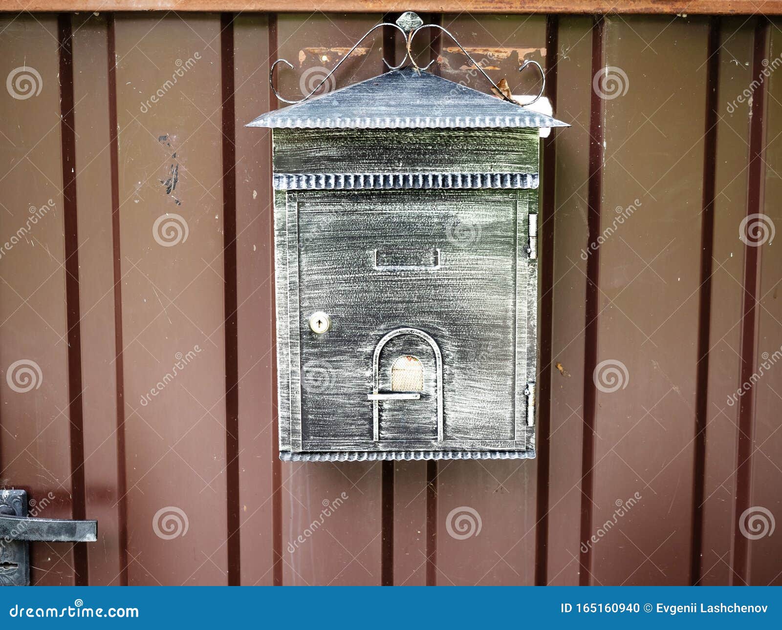 Patina Mailbox Hanging on a Brown Iron Door Stock Photo - Image of ...
