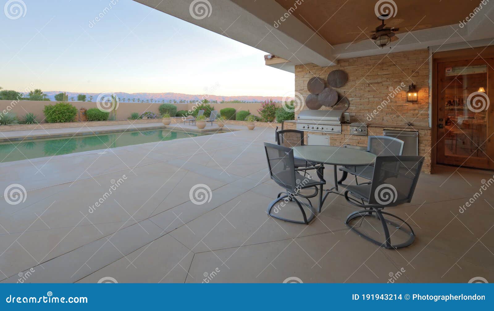 Patio and Barbecue Area with View To Pool Stock Photo - Image of ...