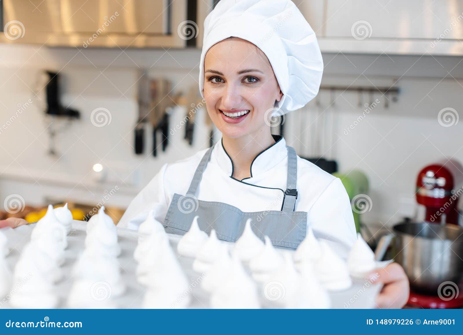 Patissier in Her Bakery Shop with Lots of Meringue Stock Photo - Image ...