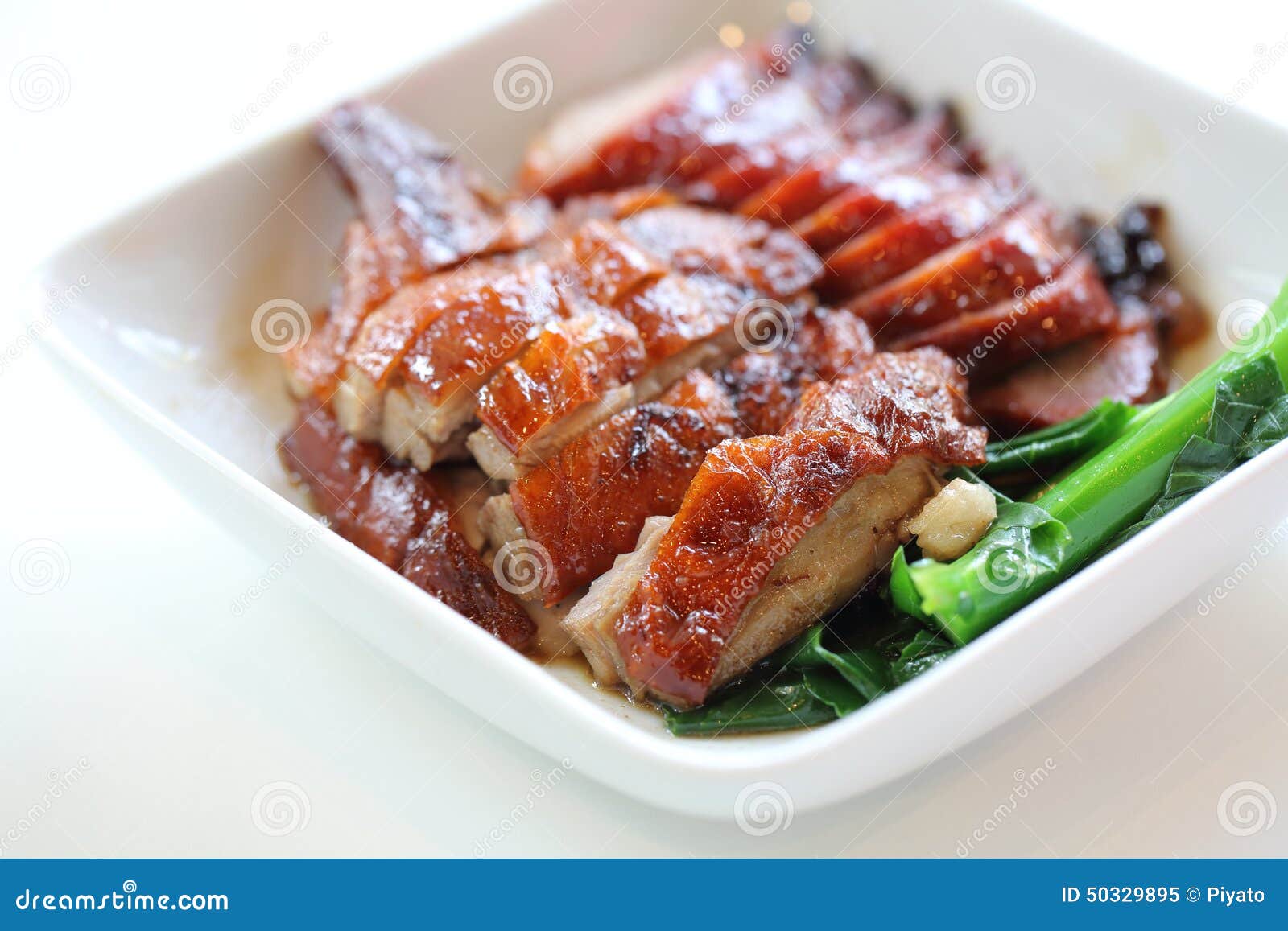 Pato y cerdo del Bbq imagen de archivo. Imagen de blanco - 50329895