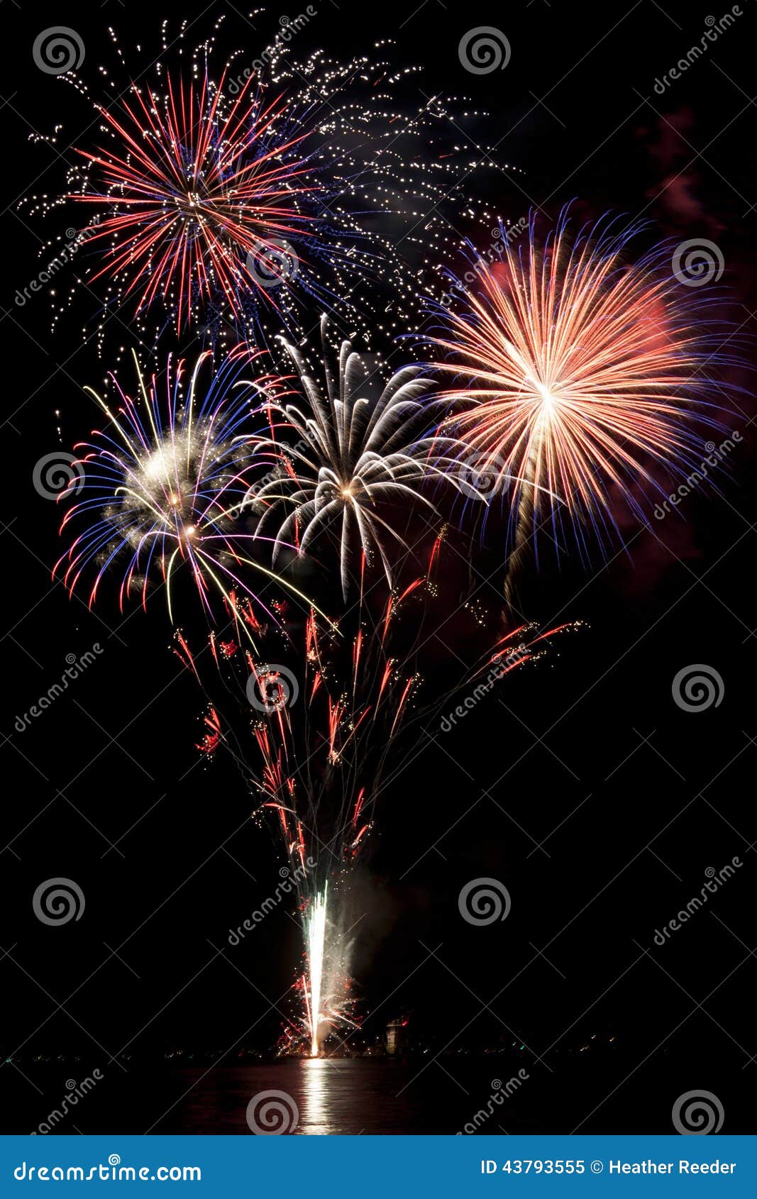 Patriotic Colored Fireworks Reflecting Over Water Stock Image - Image ...
