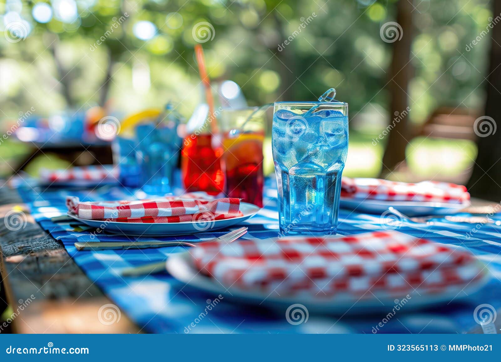 Patriotic Picnic Table Setup with American Flag-Themed Tableware Stock ...
