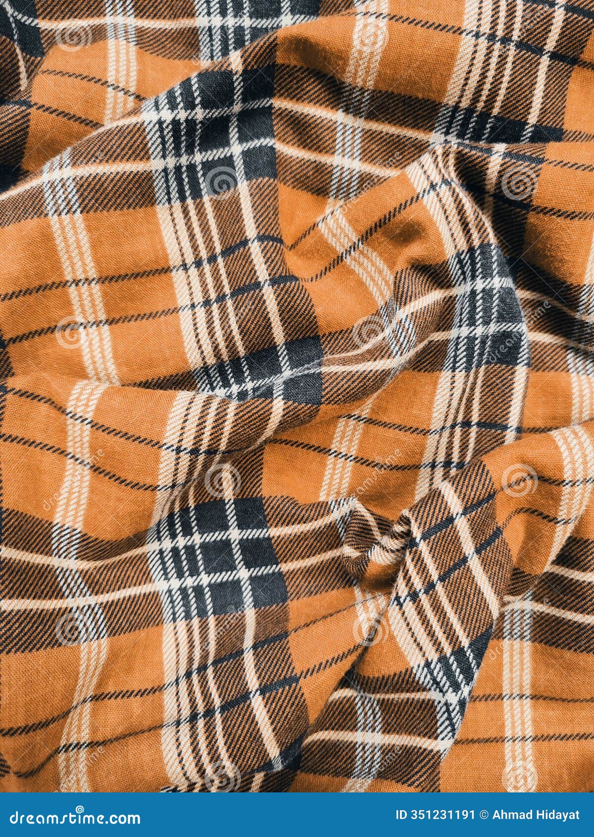 The Pattern and Background of the Fabric Has a Orange Checkered Motif ...
