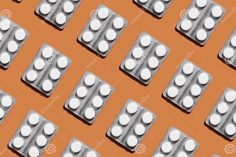 Pattern of Blister Pack with Six Round White Tablets on Orange ...