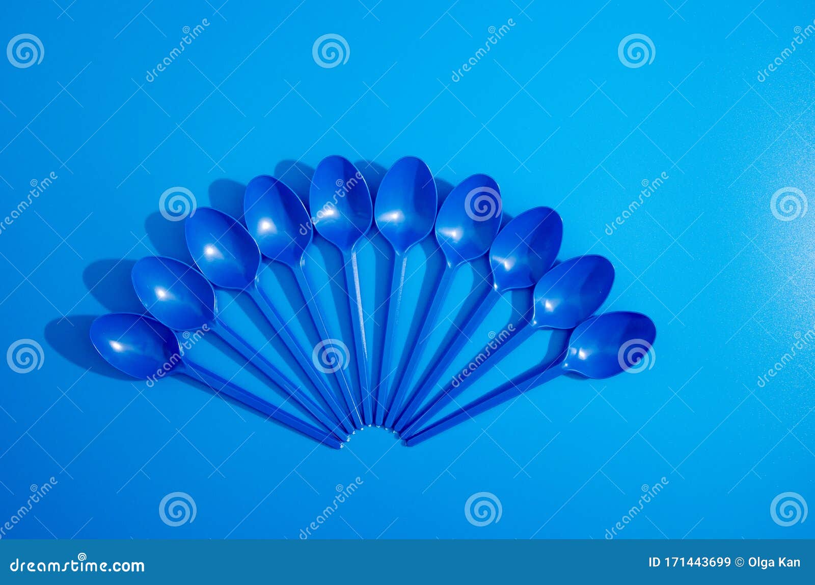 Pattern of Blue Plastic Spoons on Blue Background. Blue Color of 2020 ...