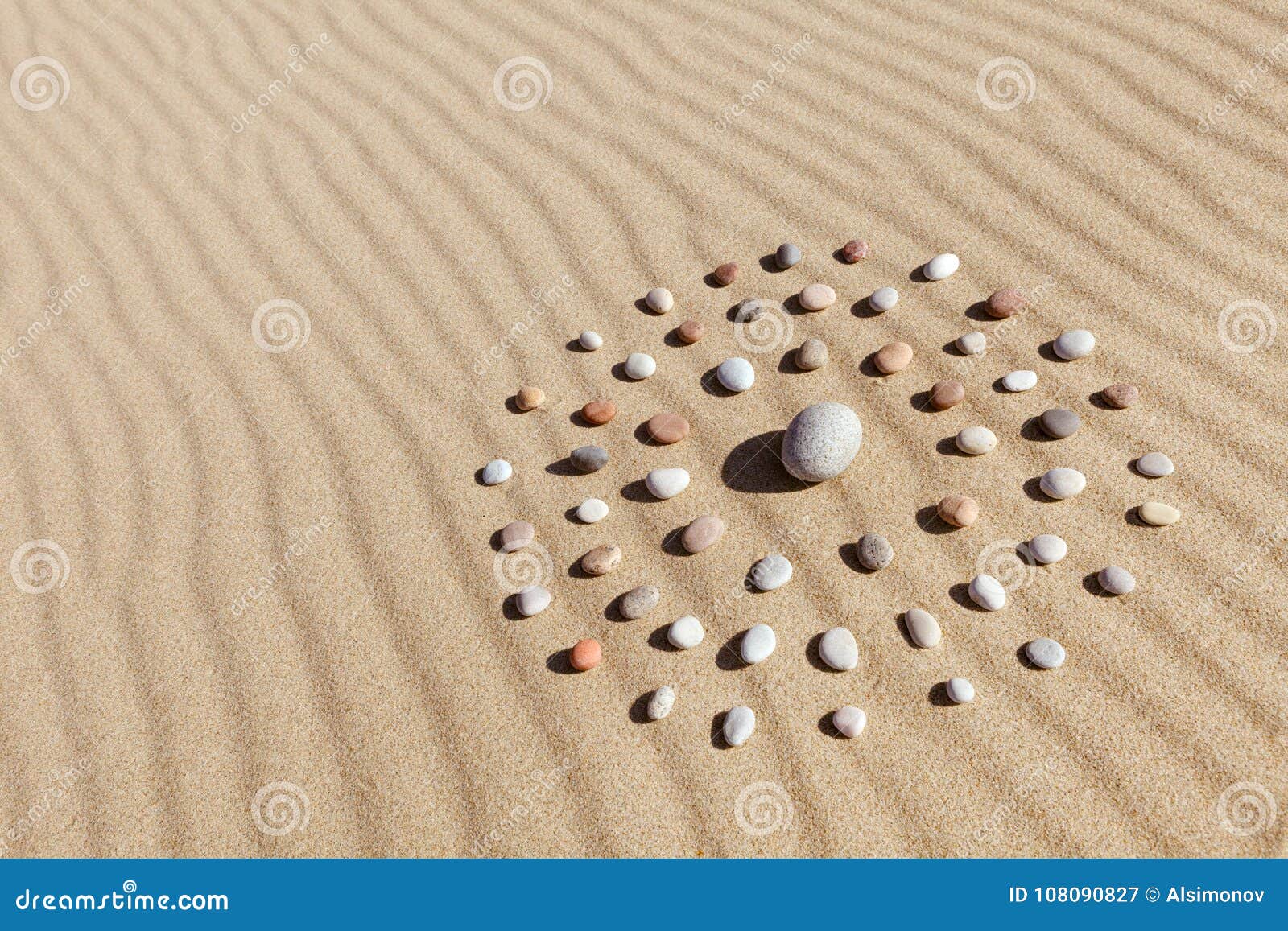 Pattern of Colored Pebbles in the Shape of a Circle on Clean Sand Stock ...