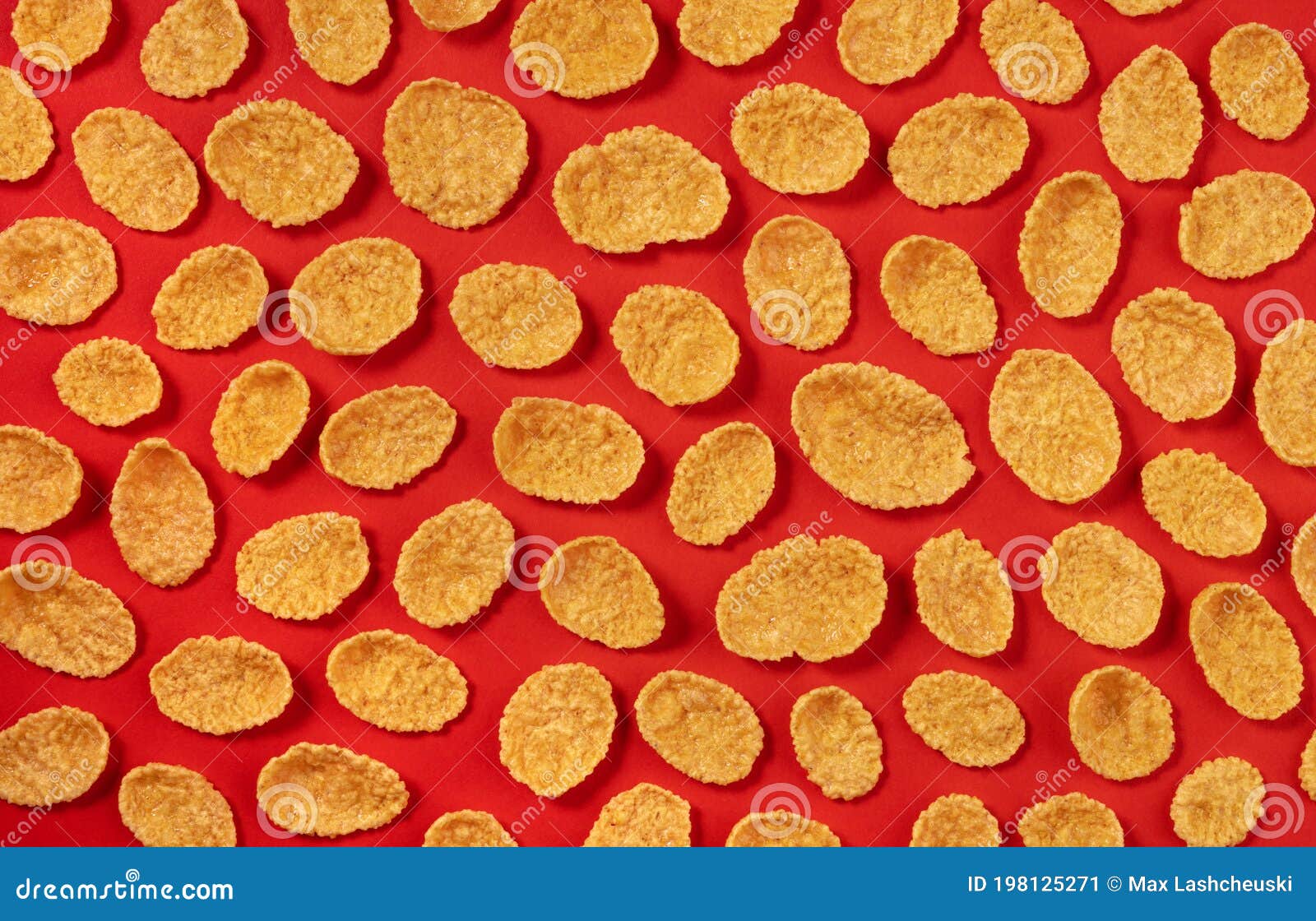 Pattern of Corn Flakes on Red Color Background, Top View Stock Image ...