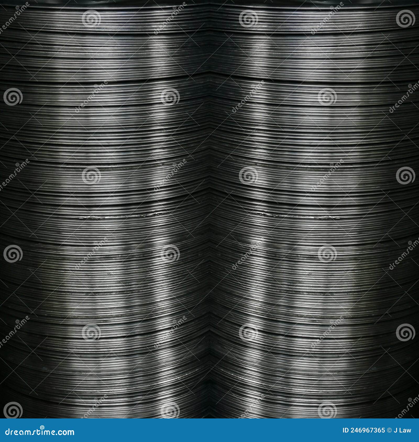 Columns of Shiny Silver Coloured Metallic Stainless Steel Plates Stock ...