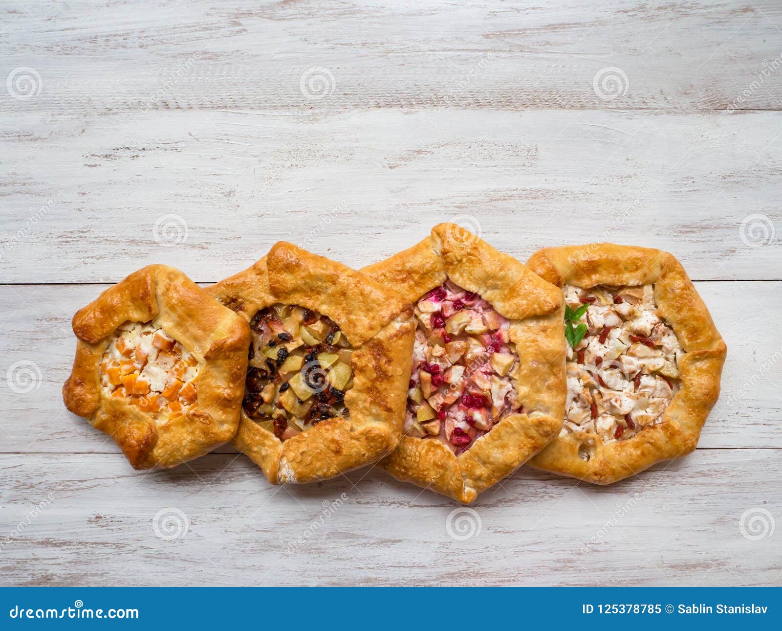 Pattern of Different Handmade Pies on a White Wooden Table. Stock Image ...