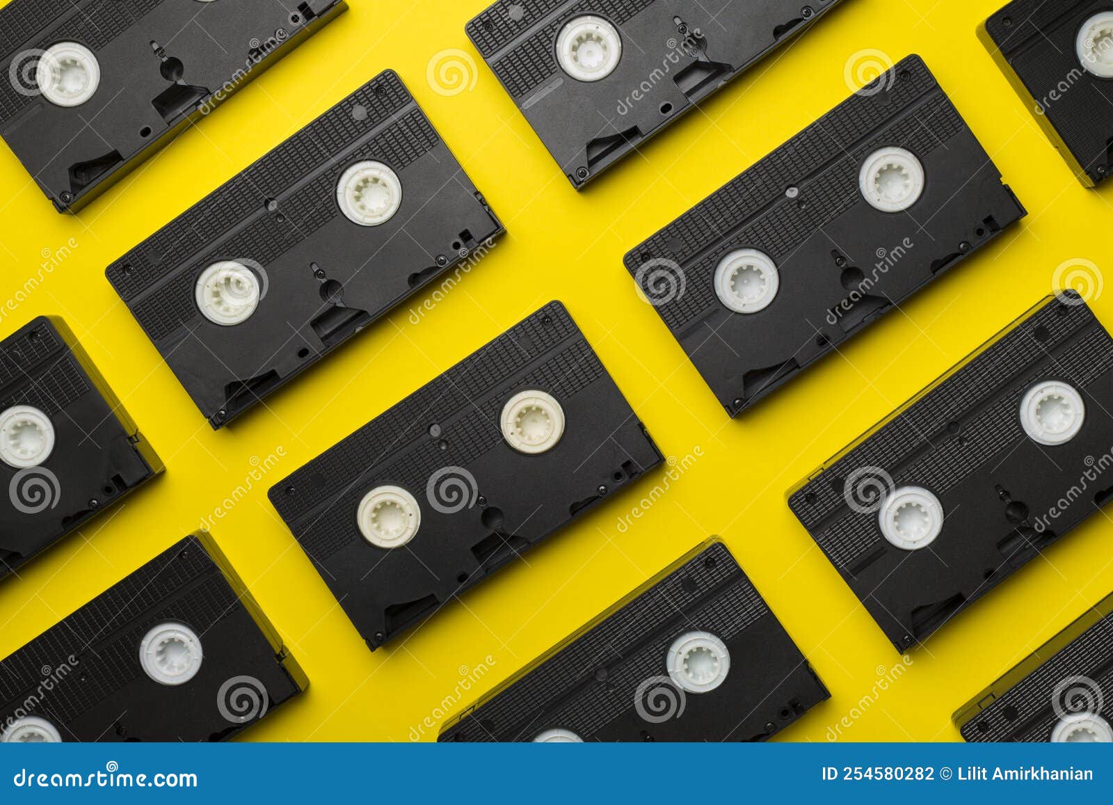 Pattern Made with Old Tape VHS Cassette on Color Background, Top View ...