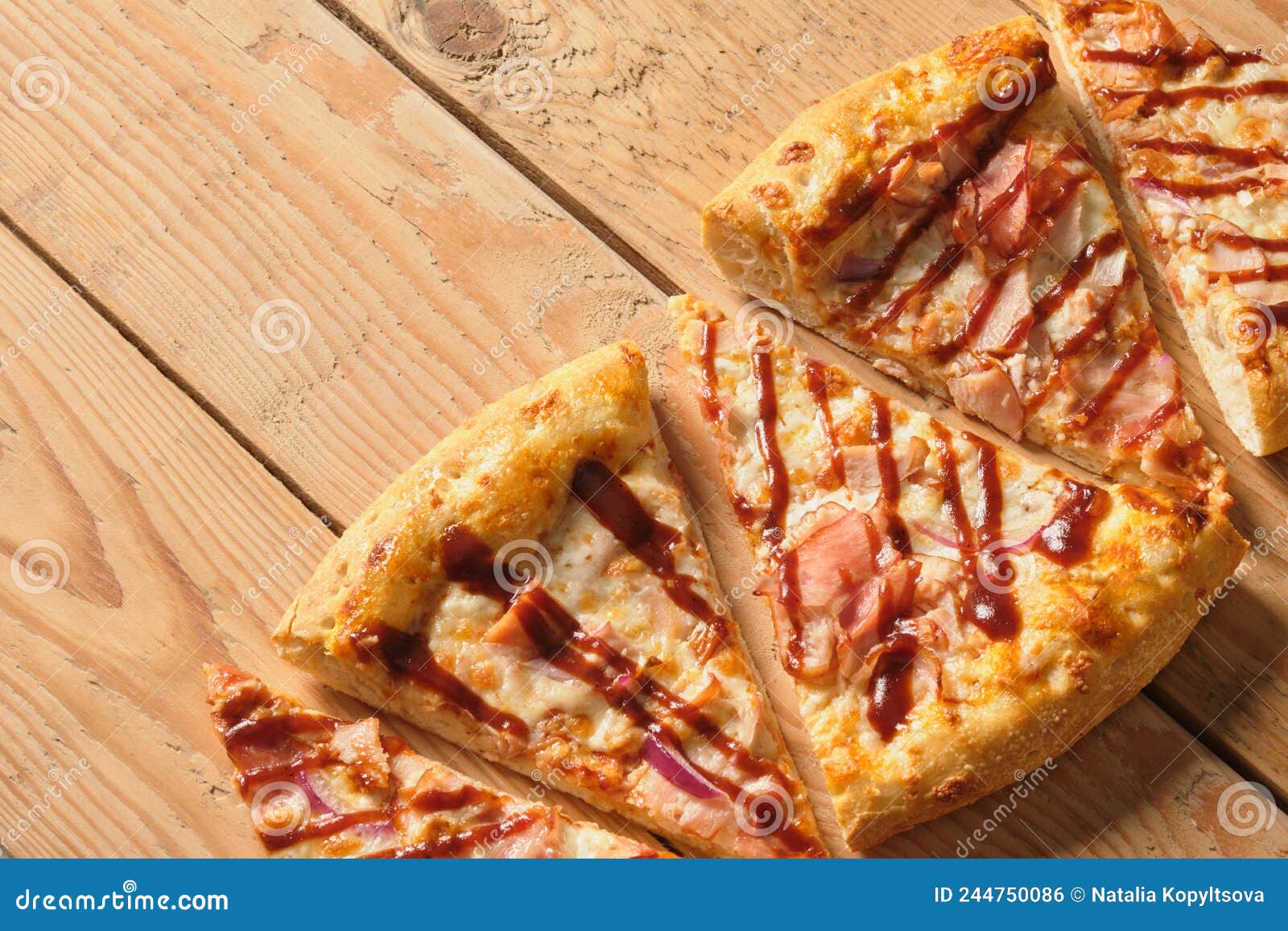 Several Slices of Pizza Stacked in a Row on a Wooden Background Stock ...