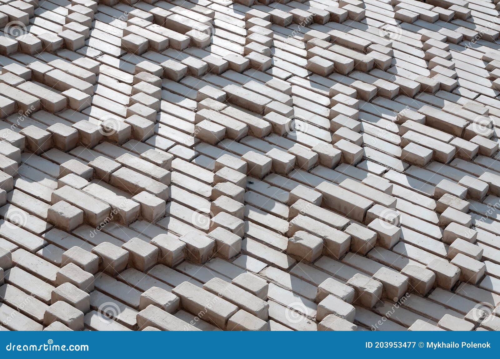 A Pattern Made of White Bricks in the Form of Diamond Shapes ...