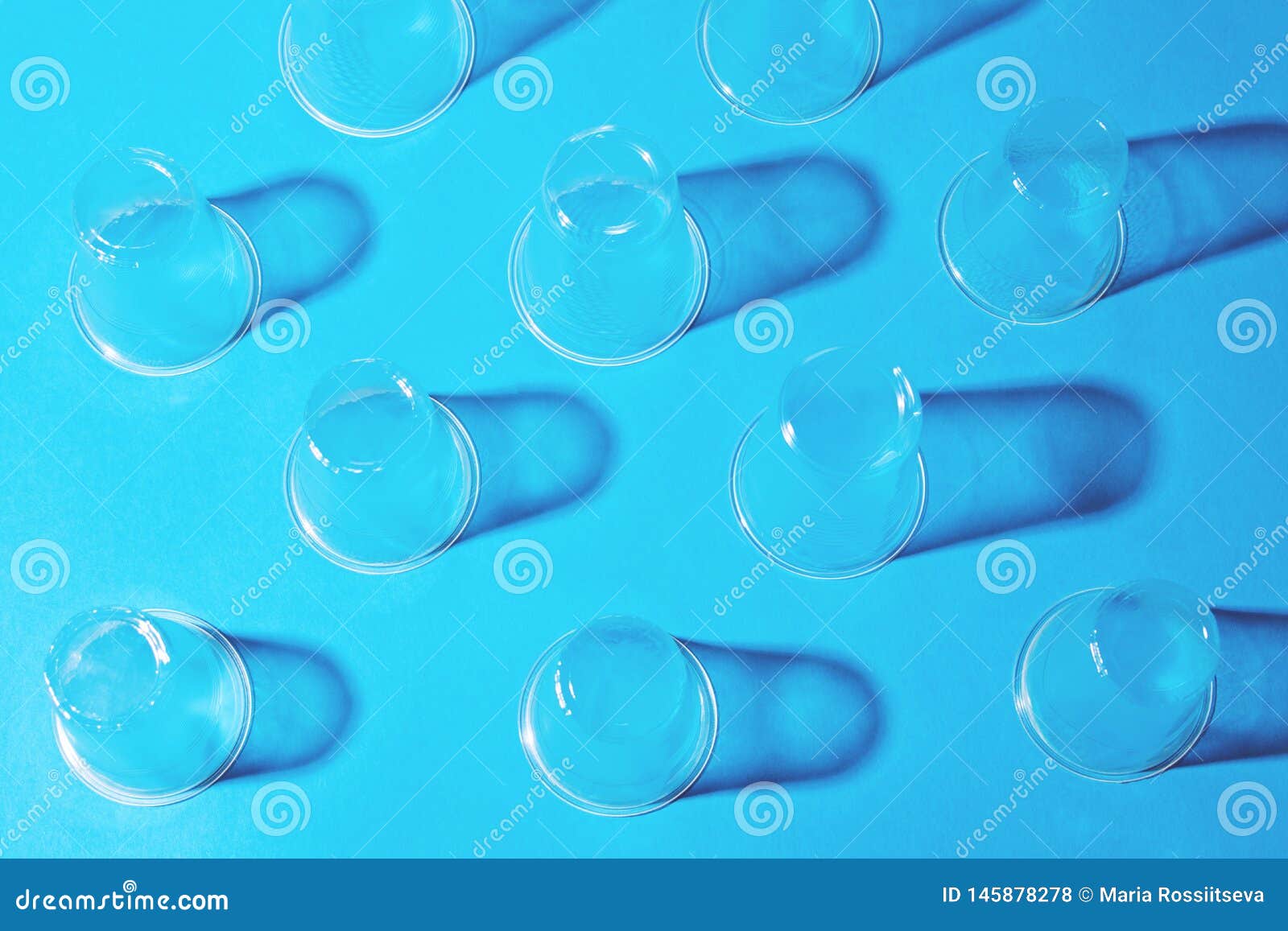Plastic Cups on Blue Background Stock Photo - Image of earth, close ...