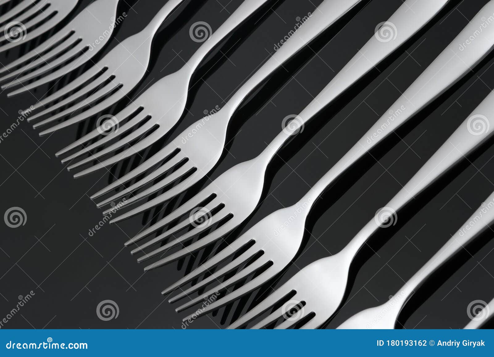 Pattern with Many Silver Forks on Black Mirror Background. Concept ...