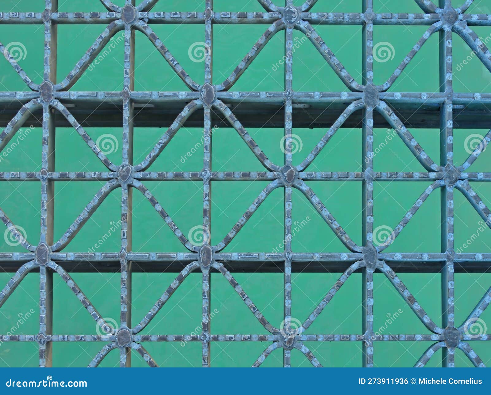 Pattern on a Metal Grate Over Blue Water Stock Photo - Image of steel ...