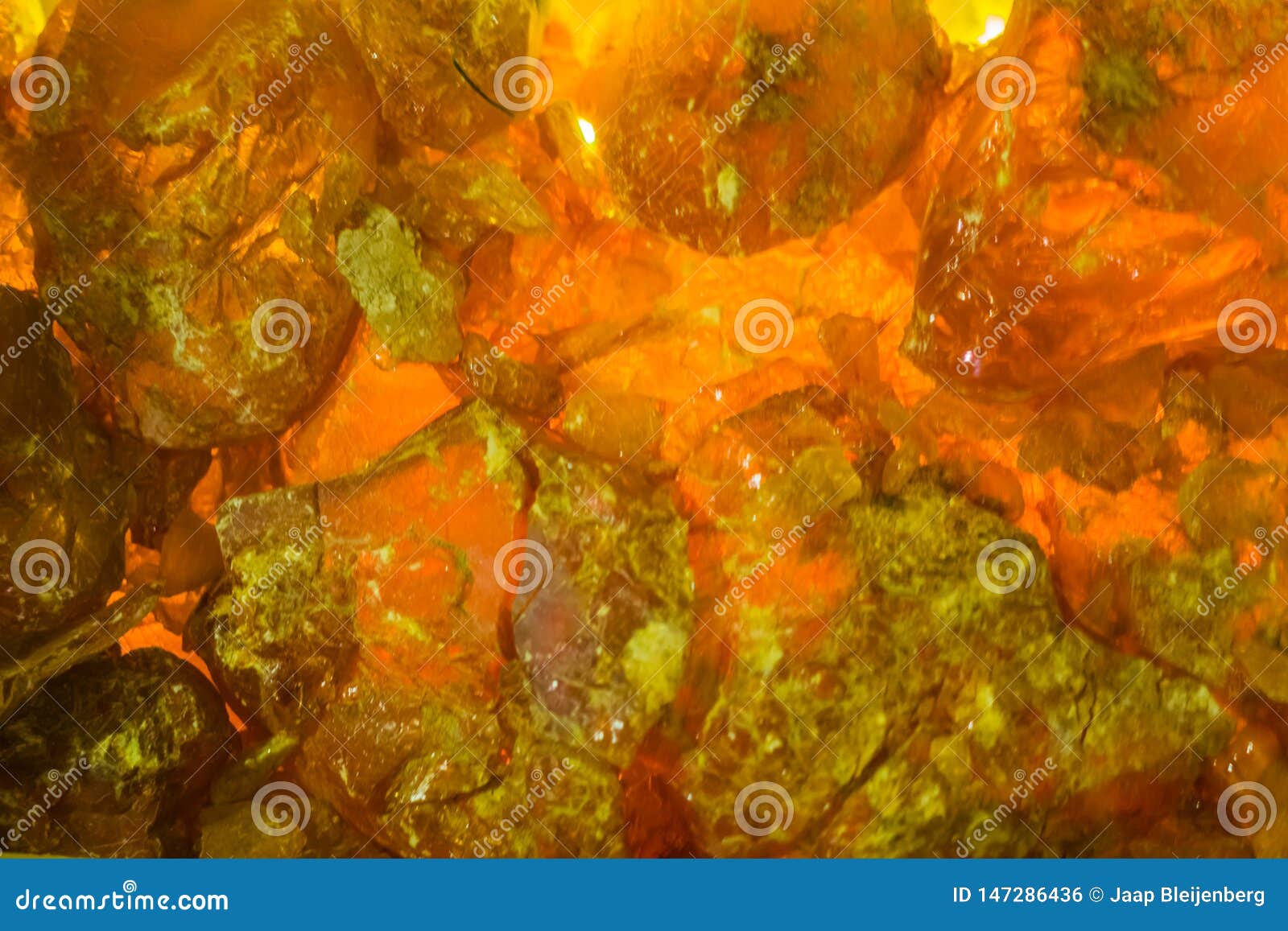 Pattern of Orange Glowing Mineral Stone in Macro Closeup, Mining ...