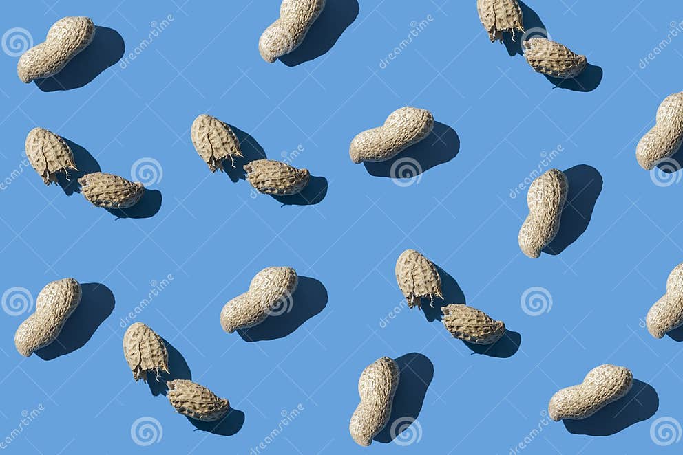 Pattern of Peanuts on a Blue Background. Flat Lay. Minimal Background ...