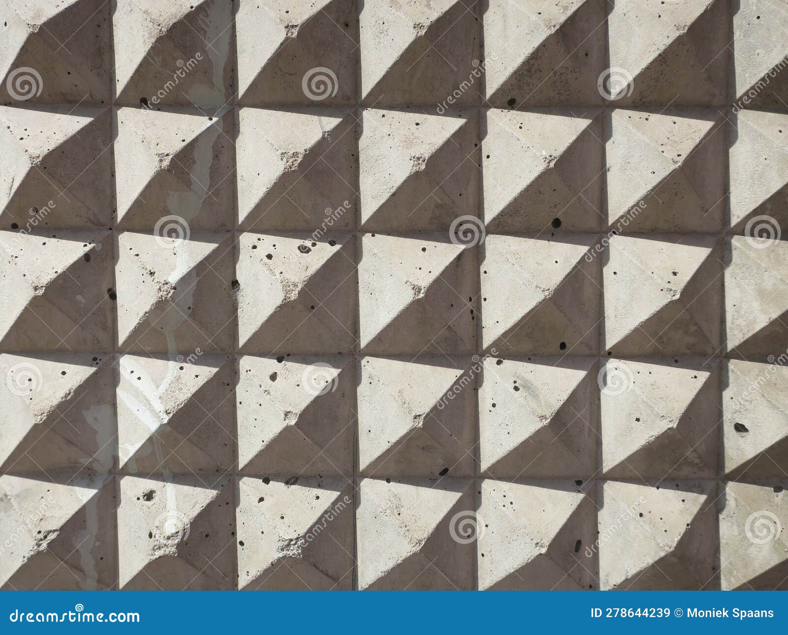 Pattern of Piramid Shapes with it S Shadow on a Stone Wall Stock Image ...