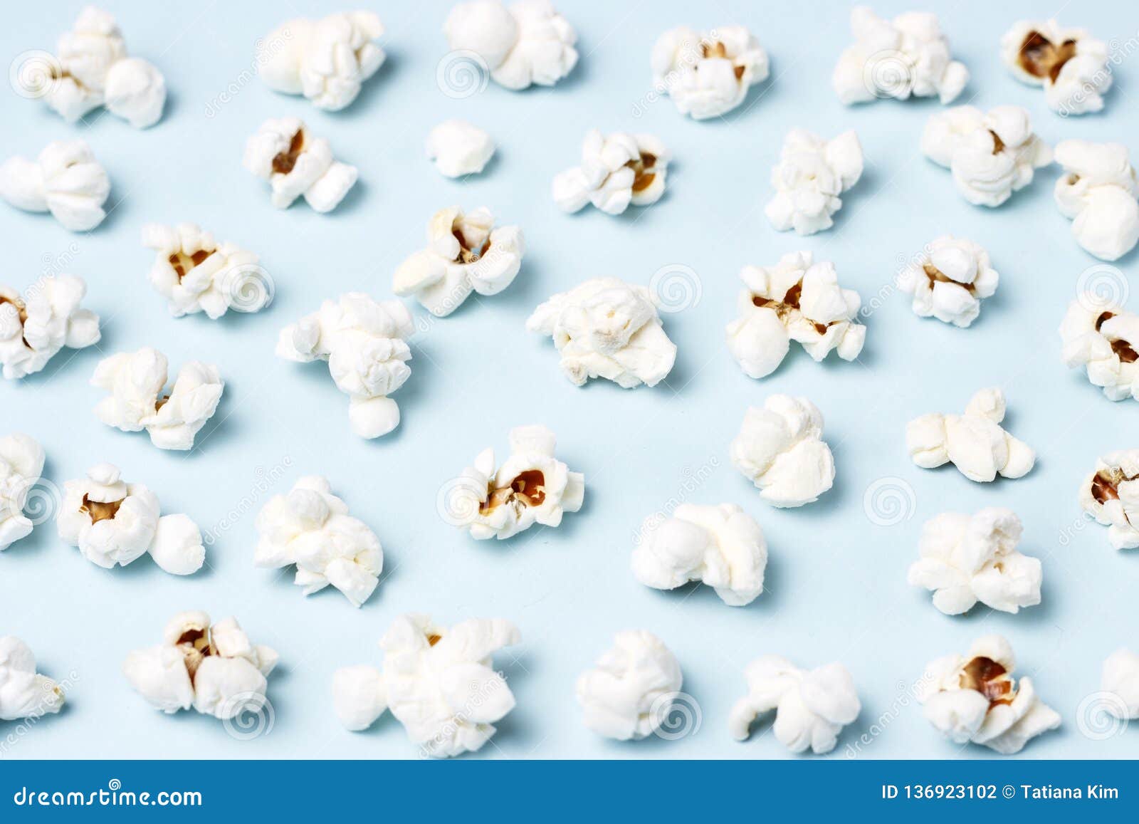 Pattern of Popcorn on a Blue Background Close-up, Top View, Texture ...