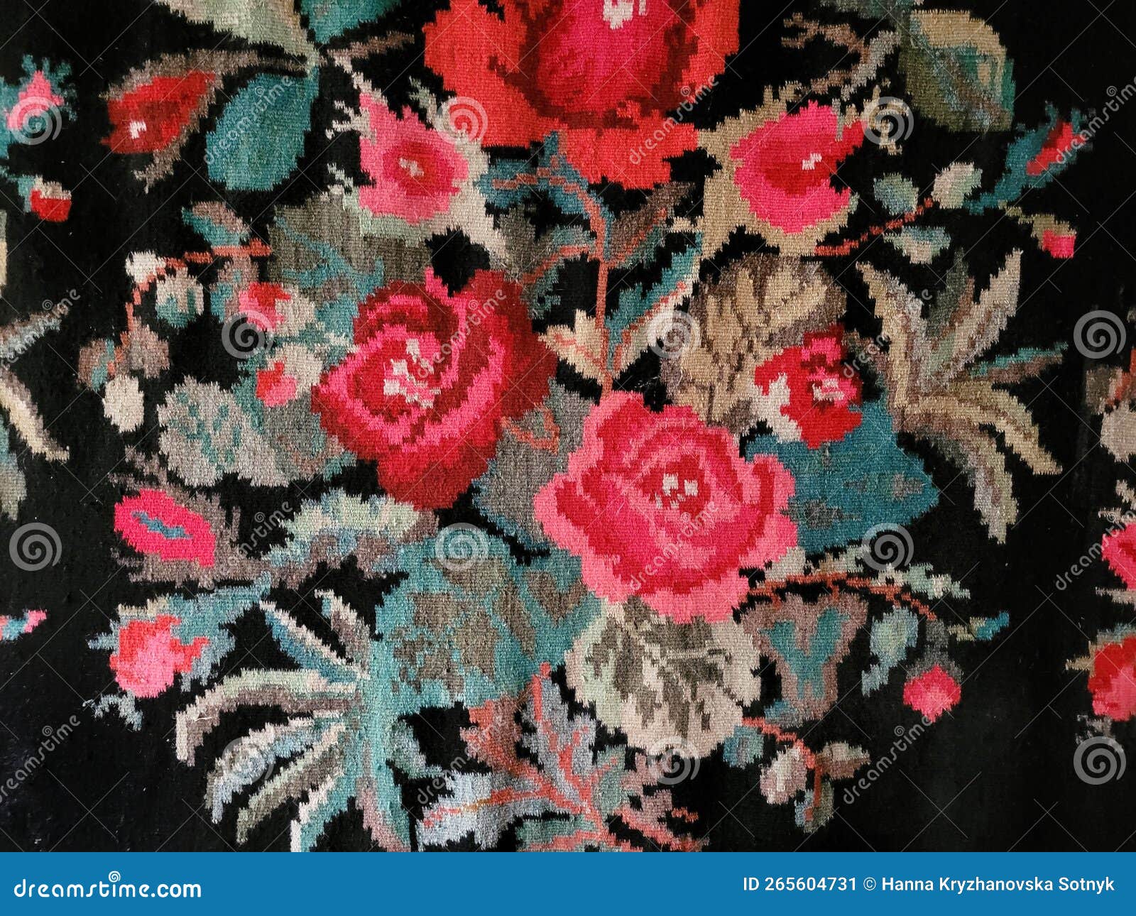 A Pattern of Red Flowers and Green Leaves Woven on a Carpet Stock Image ...