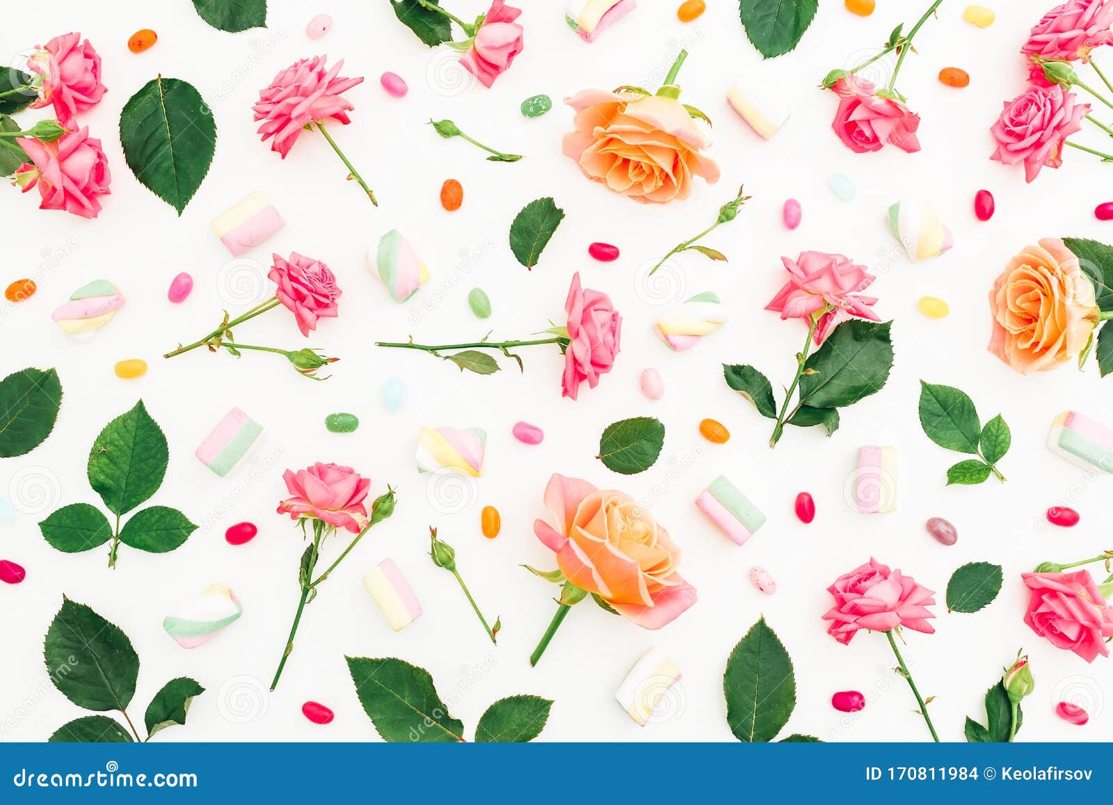 Pattern of Roses Flowers with Candy on White Background. Flat Lay, Top ...